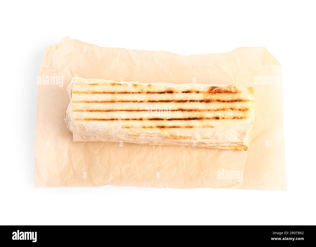 Baking paper with tasty shawarma on white background Stock Photo - Alamy