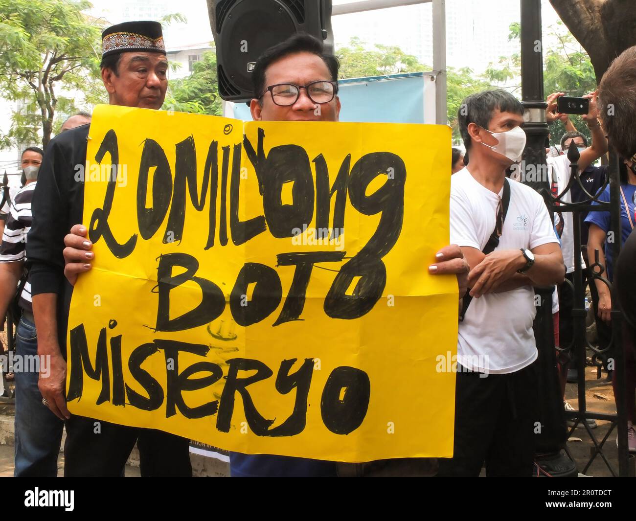 Manila, Philippines. 09th May, 2023. A protester holds a placard during ...