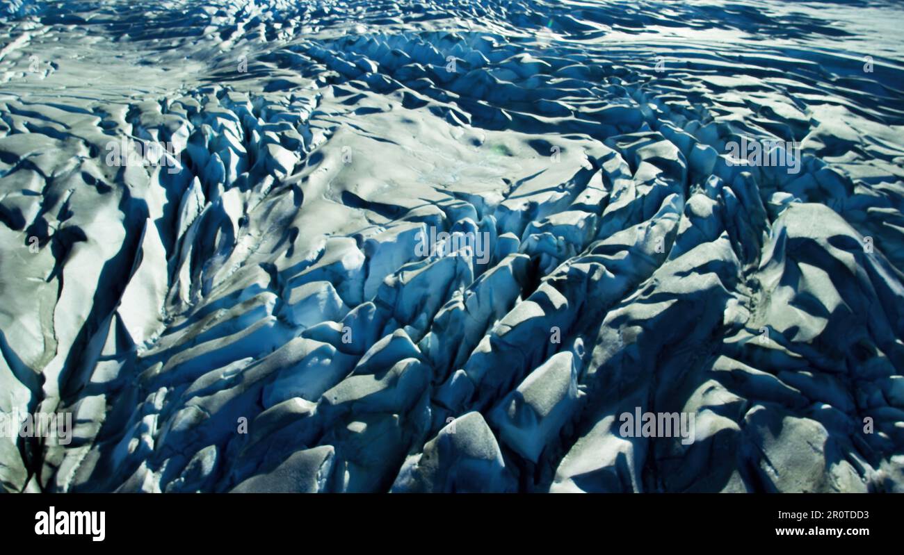 Melting glaciers present grayish-white terrain. Ice melted into rivers ...