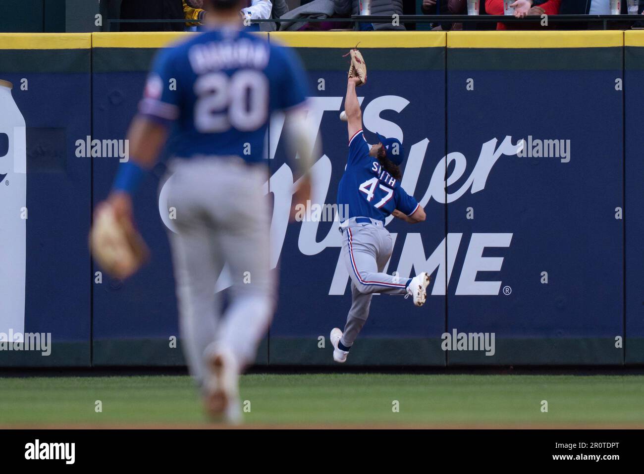 Texas Rangers right fielder Josh H. Smith cannot make the catch on a ...