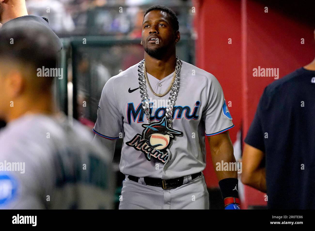 Miami Marlins' Jorge Soler walks through the dugout after hitting a two ...