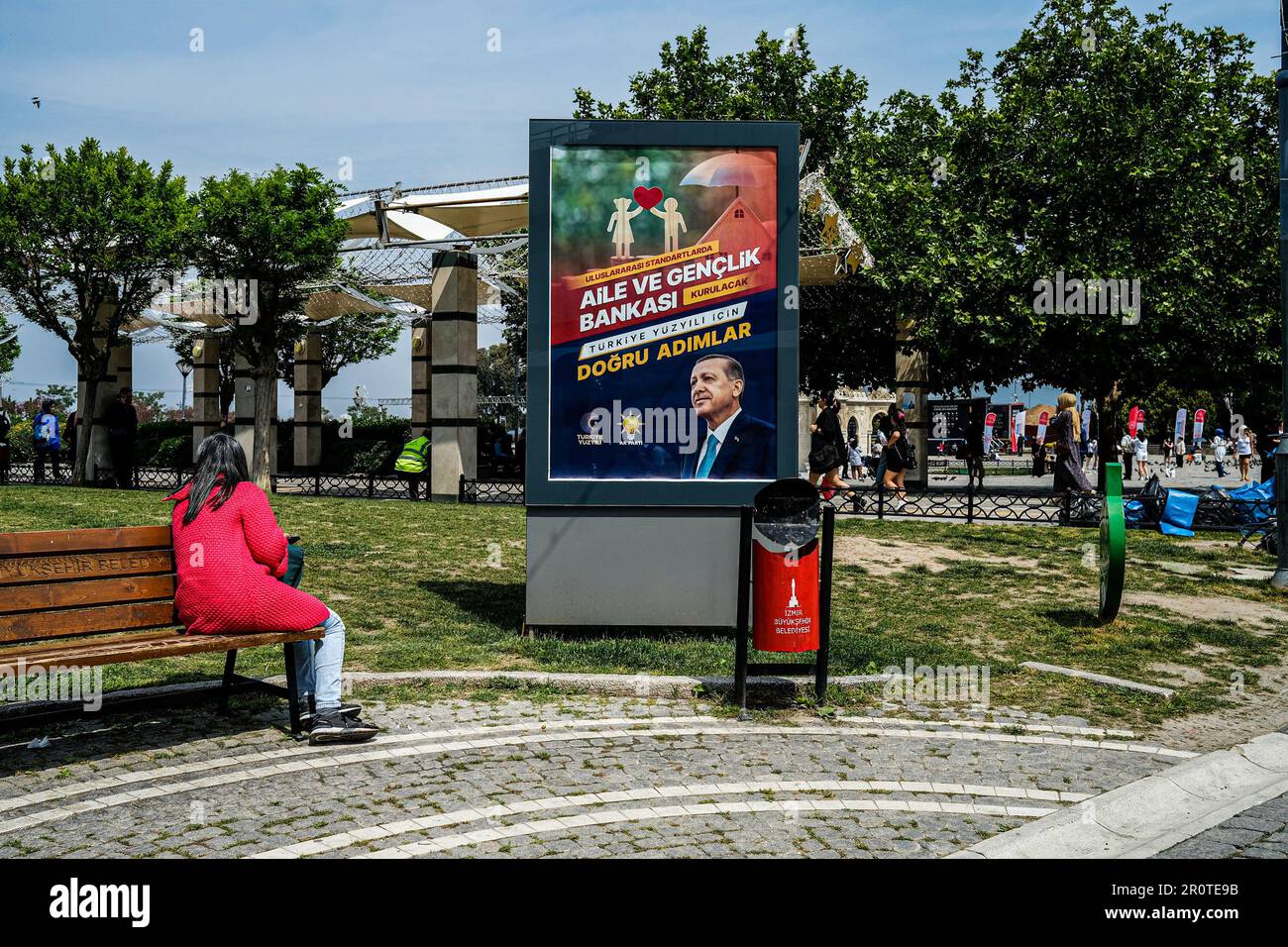 Izmir, Turkey. 09th May, 2023. A woman seen sitting on a bench in front ...