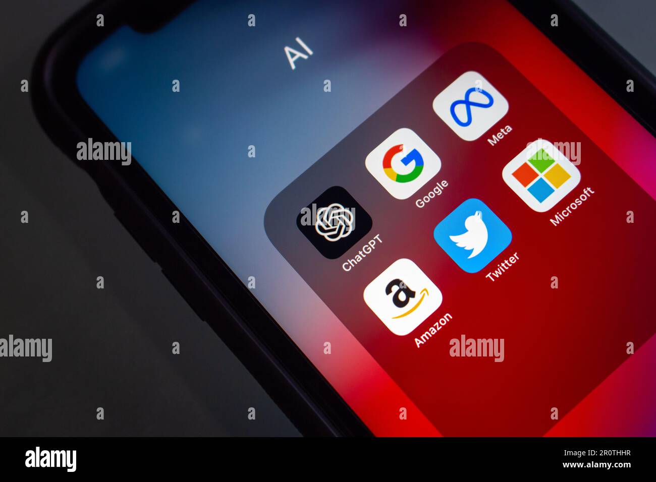 ChatGPT, Google, Meta Platform, inc., Amazon Twitter and Microsoft icons seen in an iPhone. AI ...