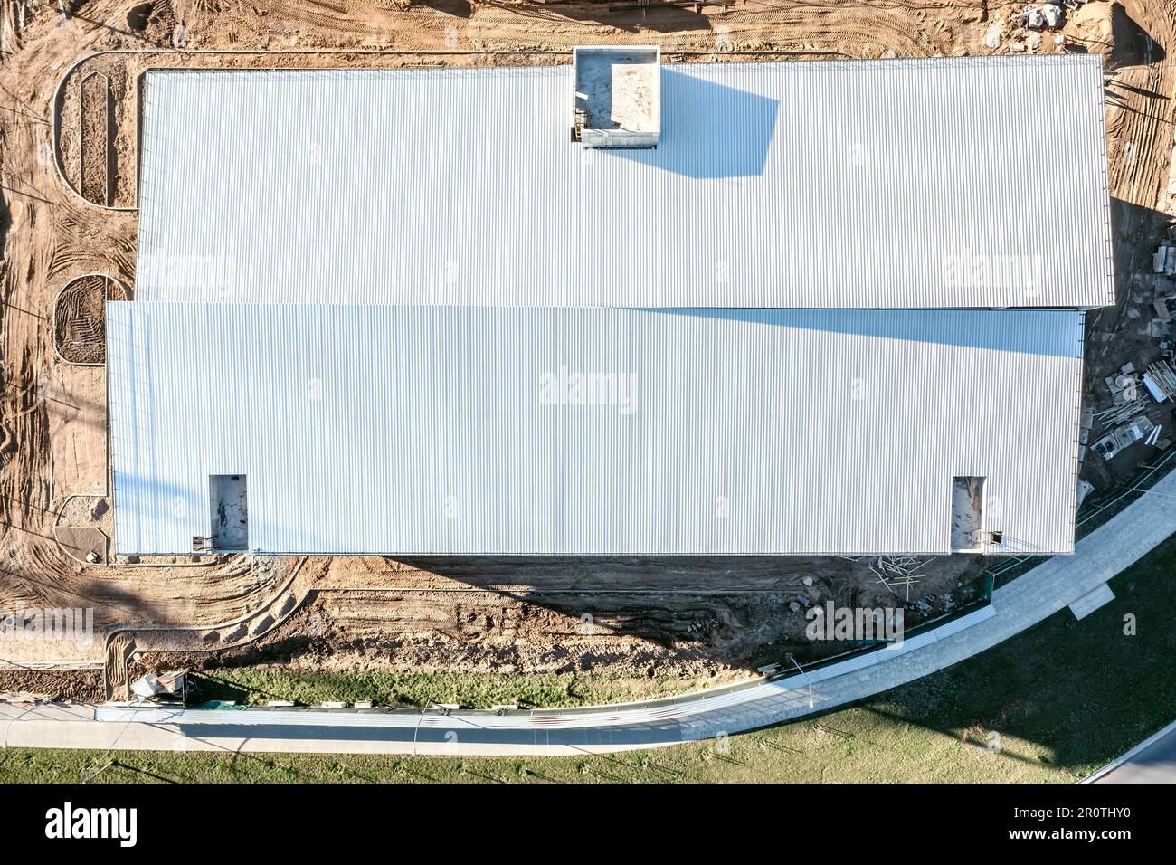 aerial top view of corrugated metal roof. new multilevel carpark under ...