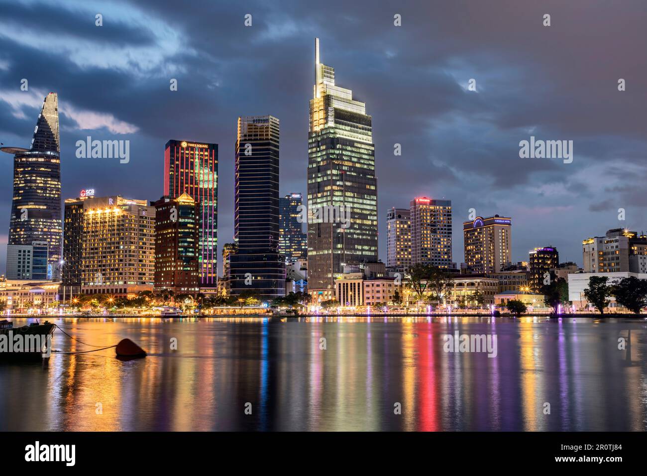Ho Chi Minh City skyline beside Saigon river at sunset, Vietnam Stock ...