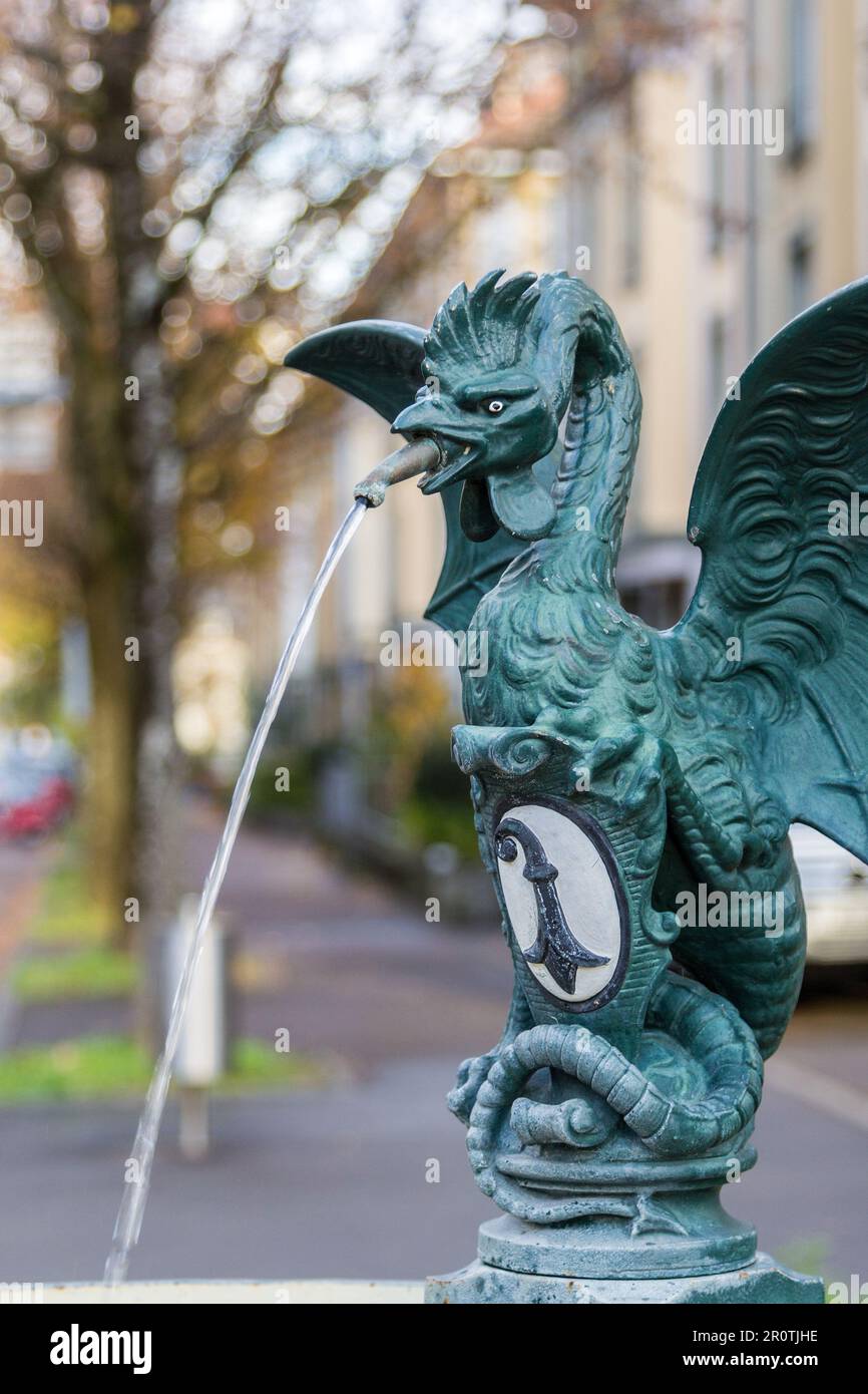 Mythical creature of basilisk on a publich water fountain with Basel ...