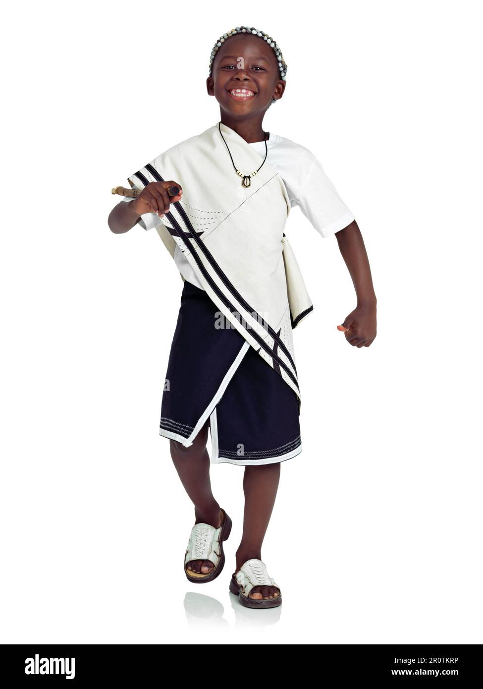 They grow up so fast. A young african boy against a white background ...