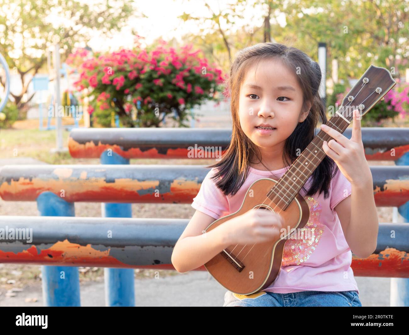 Girl playing in pipe childhood hi-res stock photography and images - Alamy