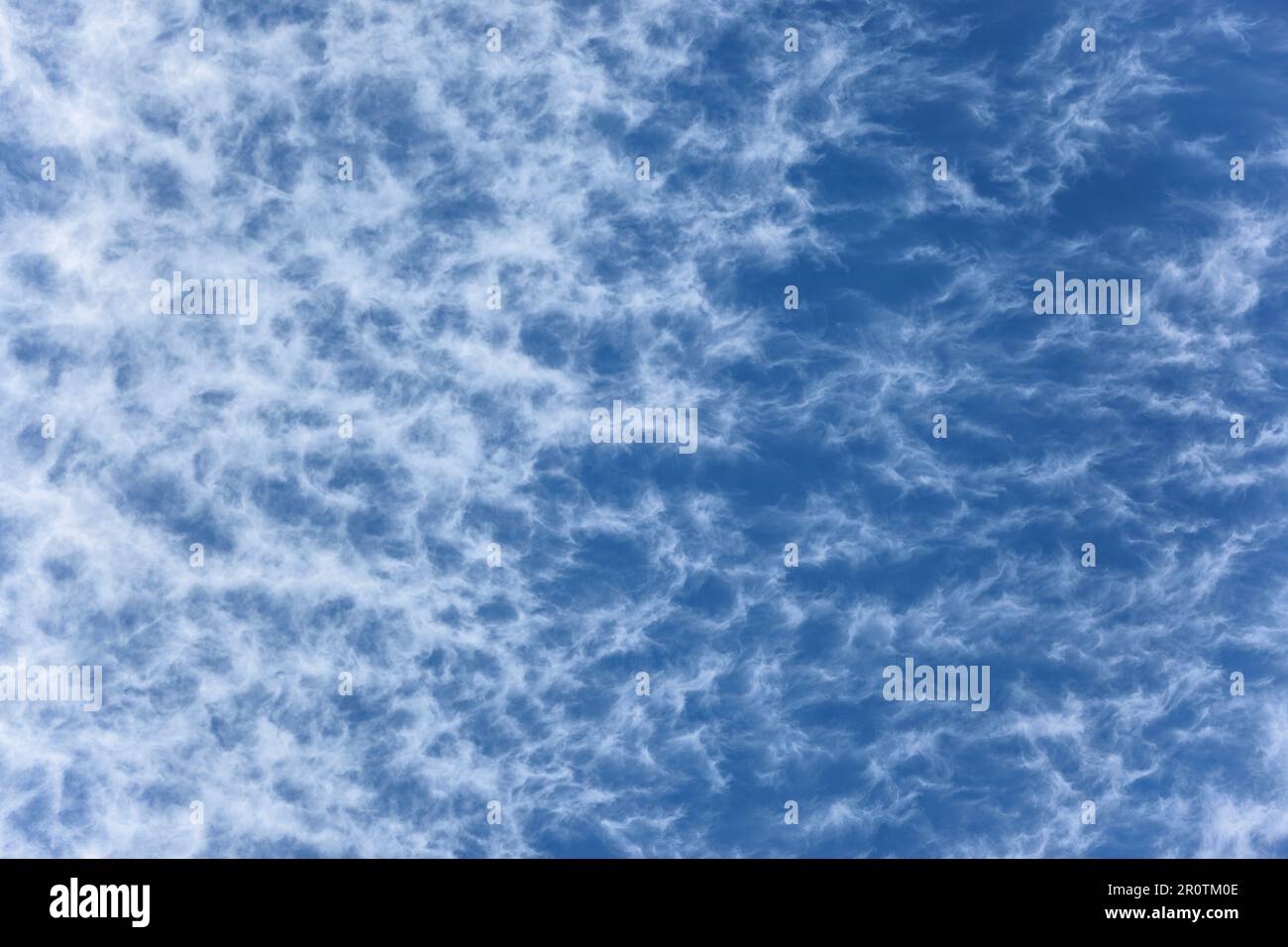 Blue sky with cloud patterns abstract background Stock Photo - Alamy
