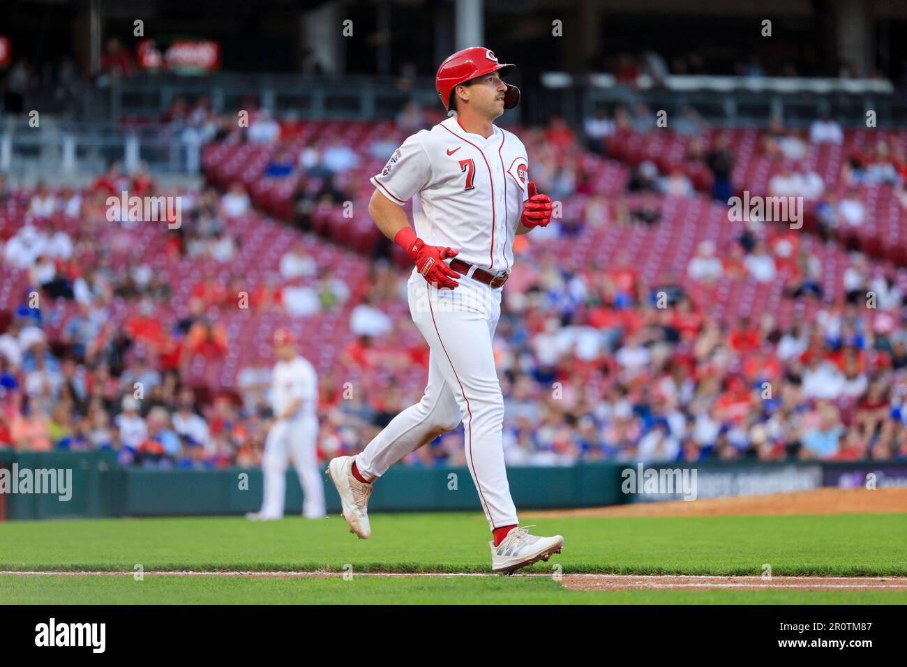 Cincinnati Reds' Spencer Steer walks to first base during a baseball ...