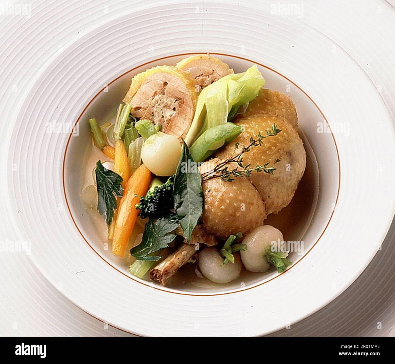 Duck leg stuffed with small vegetables Stock Photo - Alamy