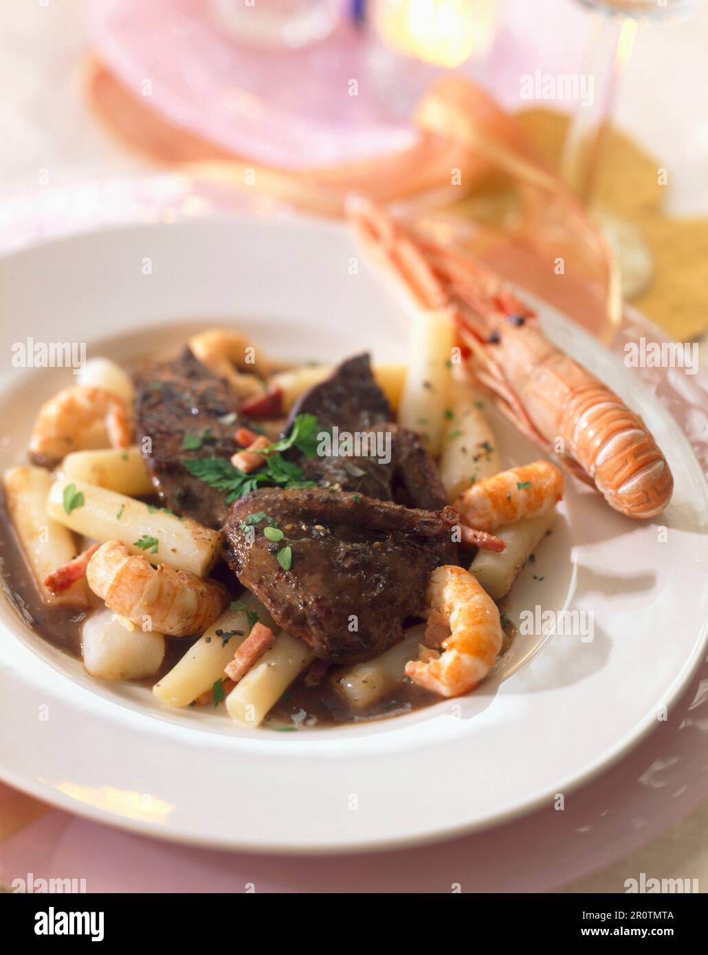 Pigeon with Dublin Bay prawns and salsifies Stock Photo - Alamy