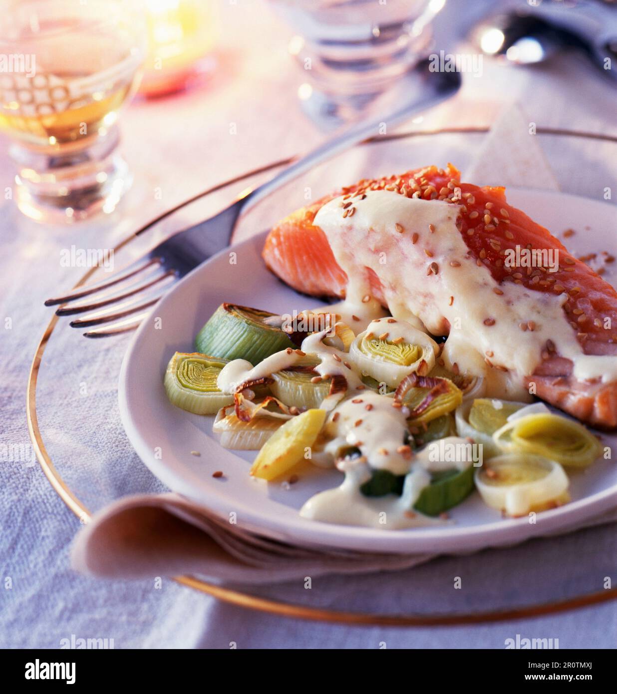 Salmon cooked on one side and leek fondue Stock Photo - Alamy