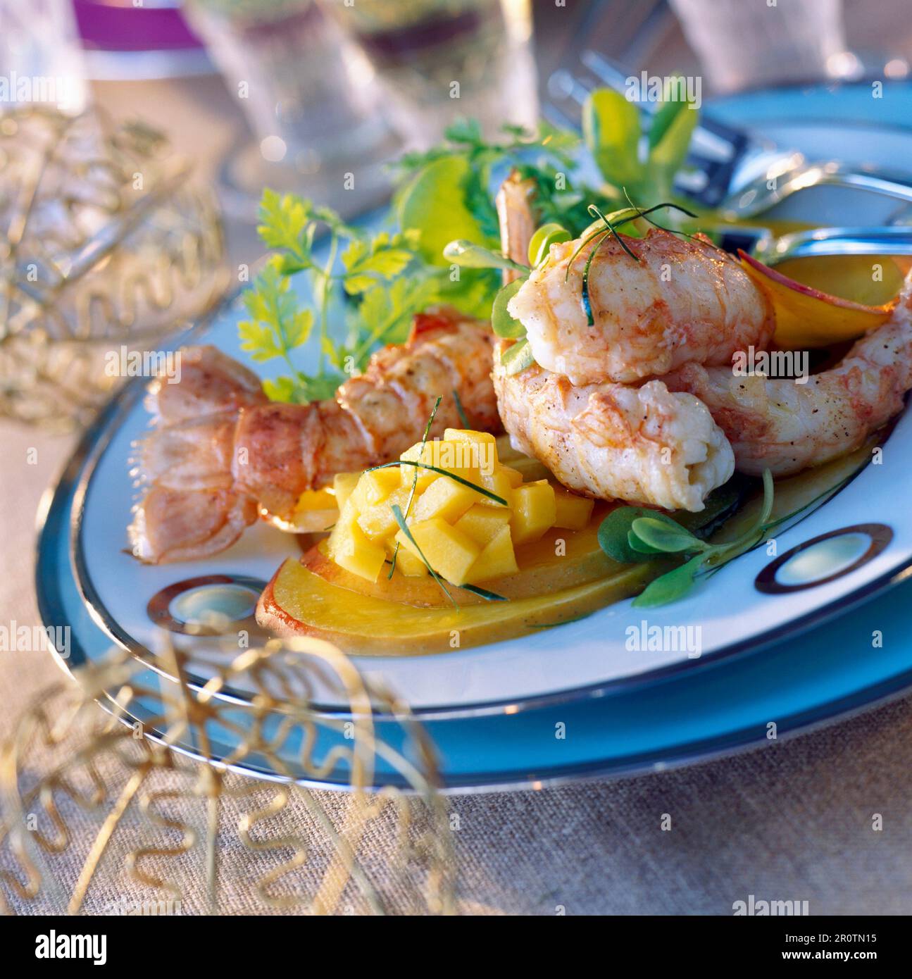 Dublin Bay prawns with mango, lime French dressing Stock Photo - Alamy