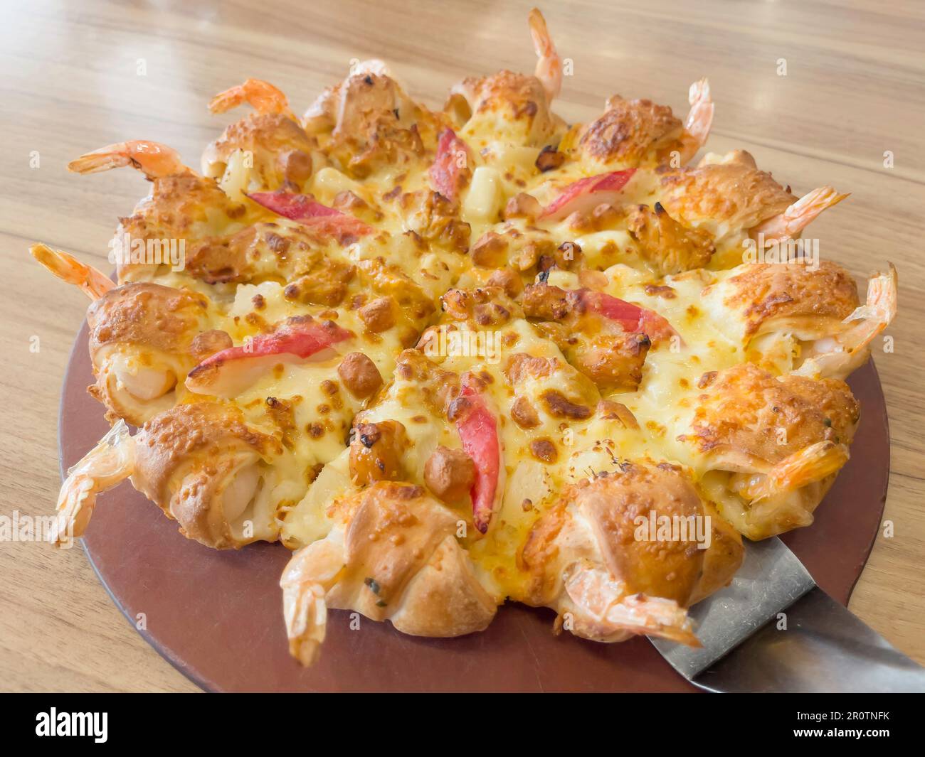 International franchise restaurant chain offers styles of pizza, stock ...