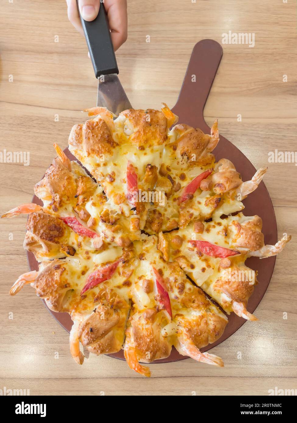 International franchise restaurant chain offers styles of pizza, stock ...