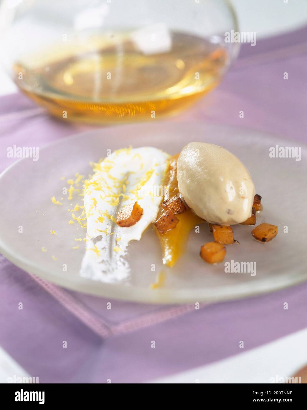 Stewed squash, lemon-flavored meringue and coffee ice cream Stock Photo ...