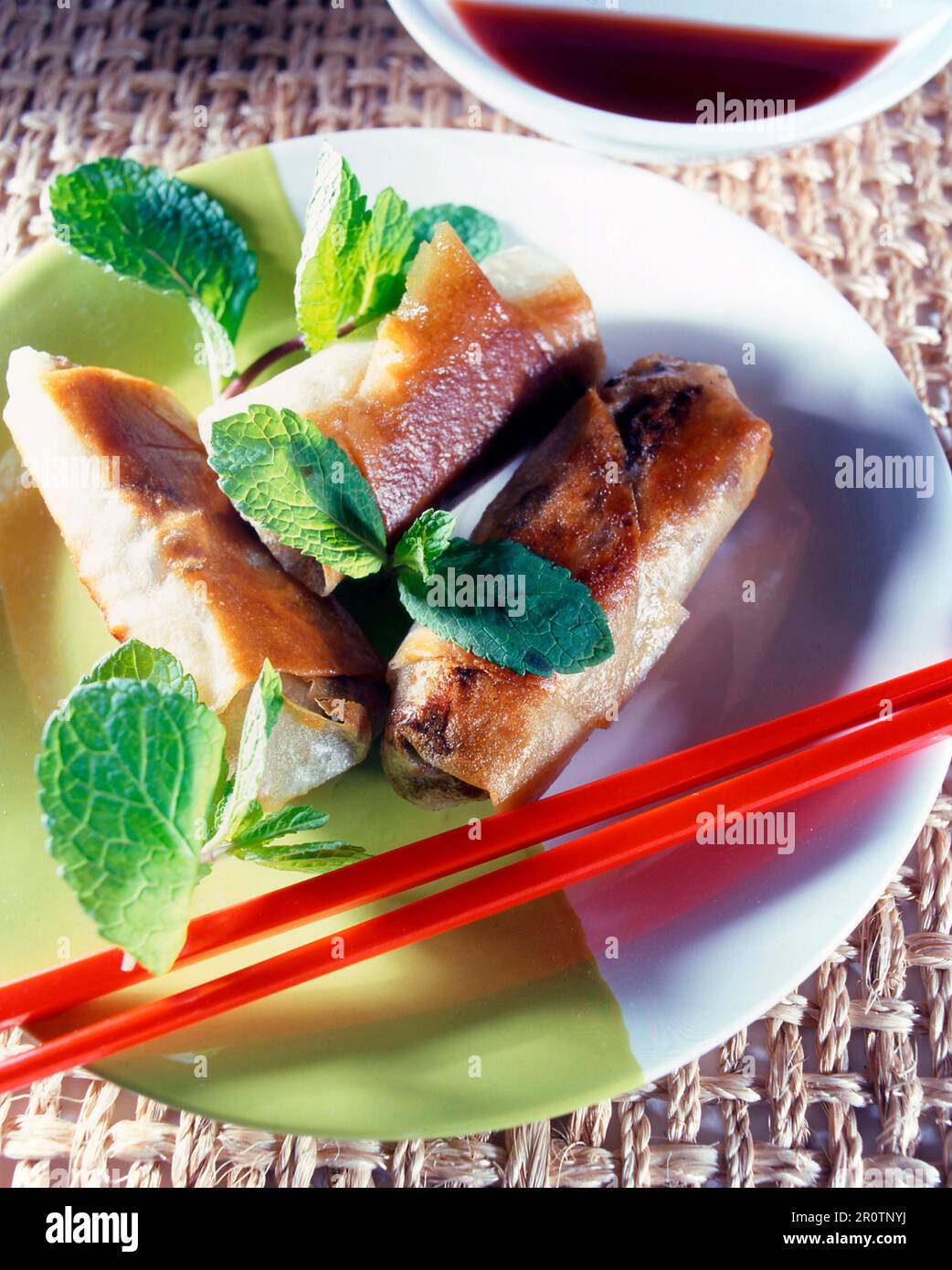 crispy rolls with beef and herbs spring onions Stock Photo - Alamy