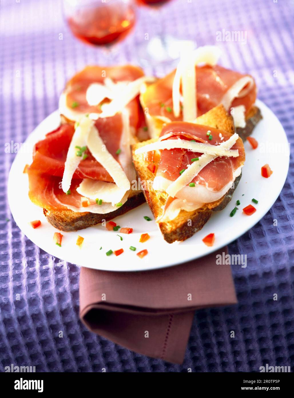 Raw ham on toast Stock Photo - Alamy