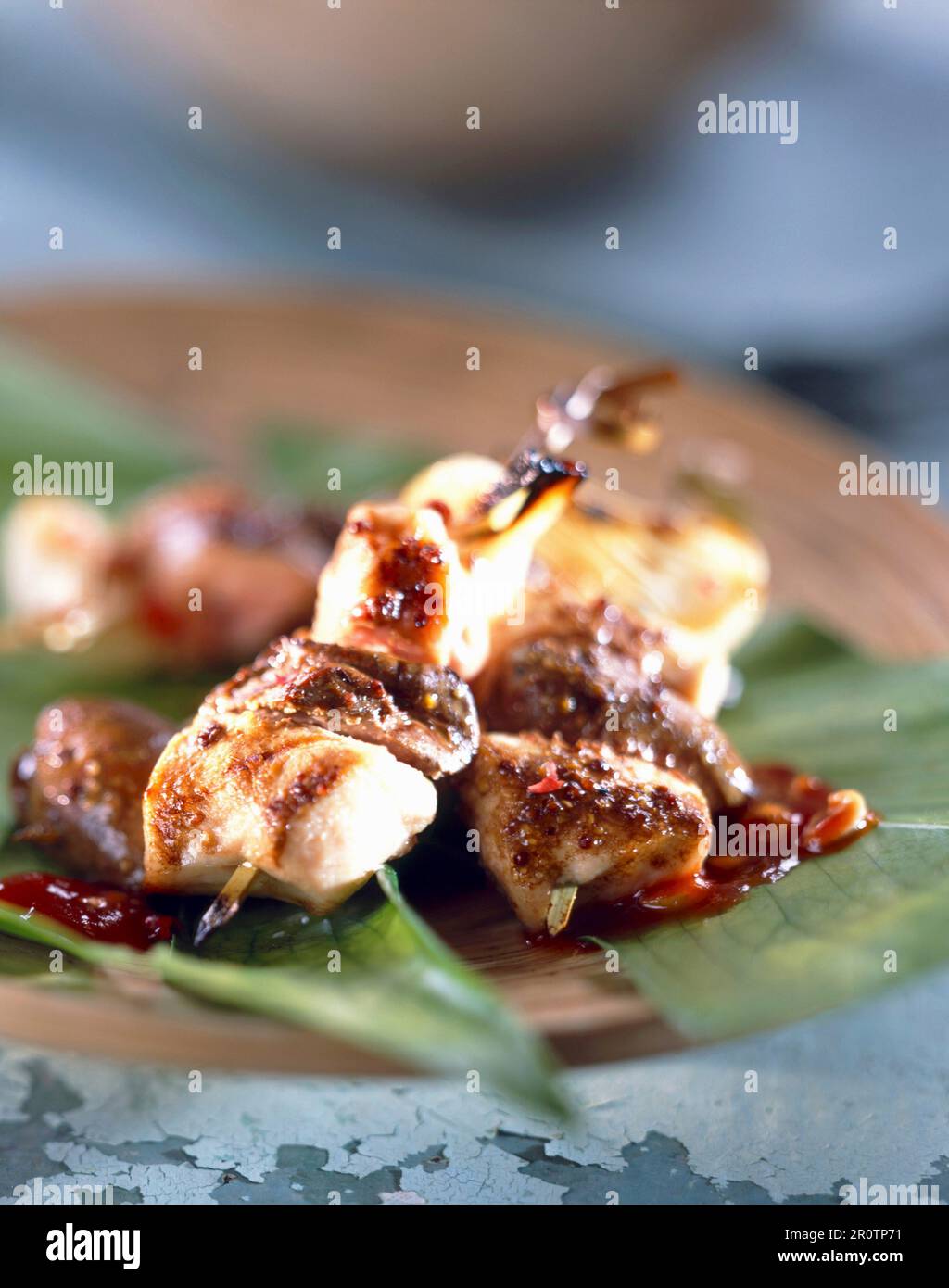 Rabbit skewers with barbecue sauce Stock Photo - Alamy