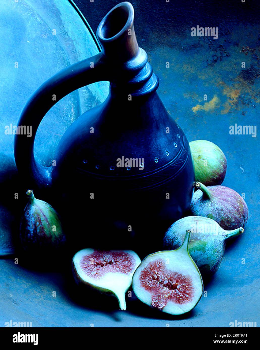 A traditional jug and fresh figs Stock Photo - Alamy