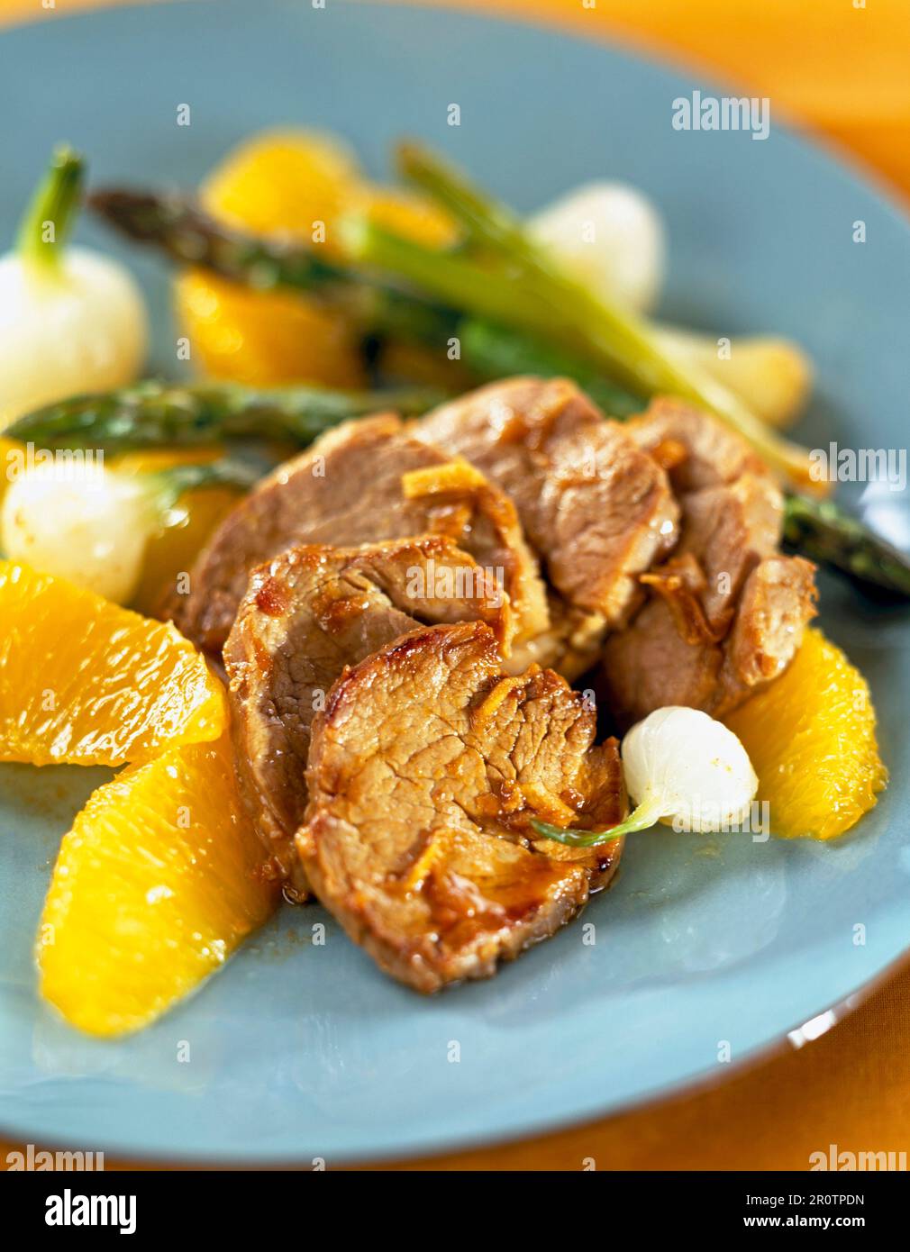 Pork filet mignon with orange Stock Photo - Alamy