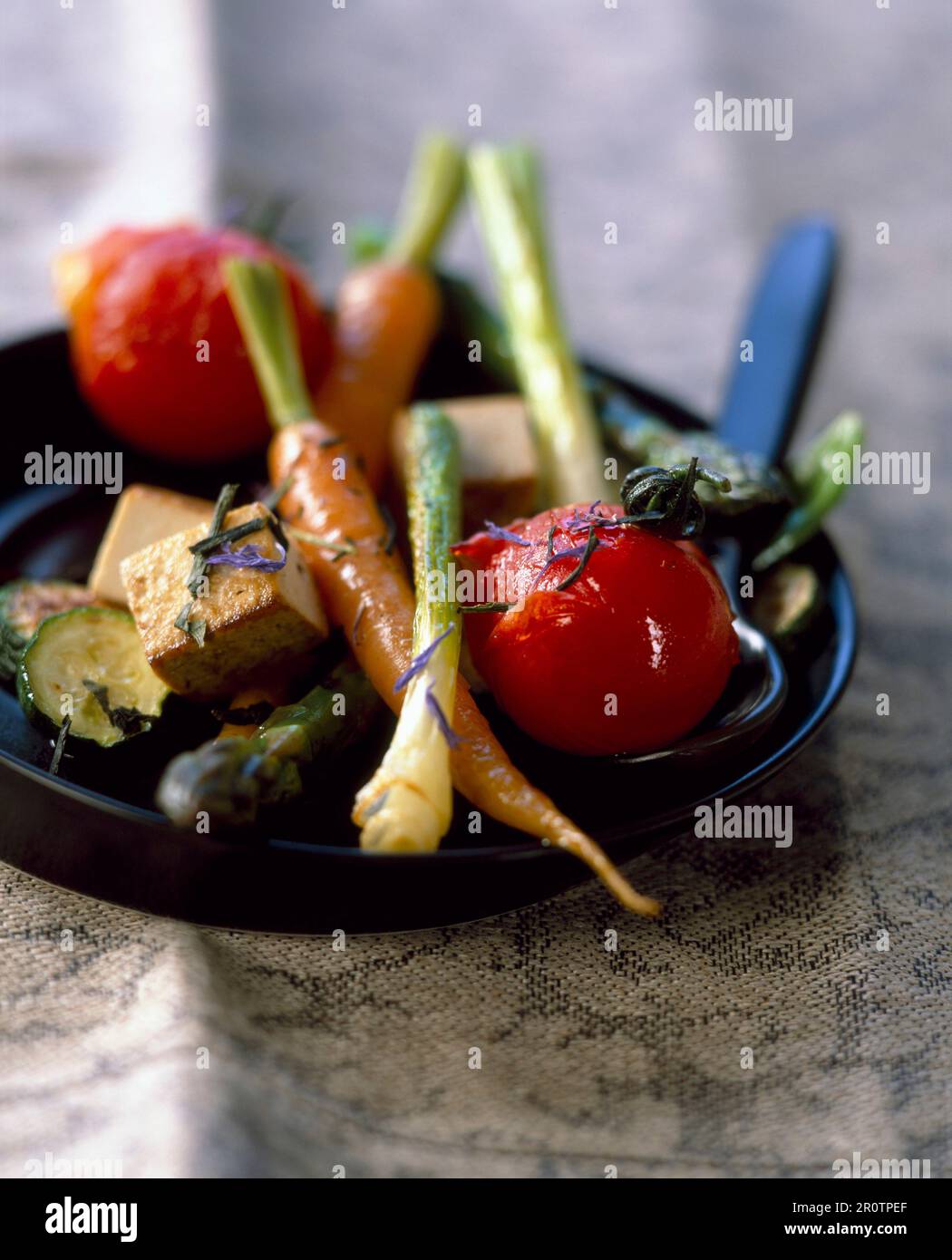 Fried vegetables with tofu and tea Stock Photo - Alamy