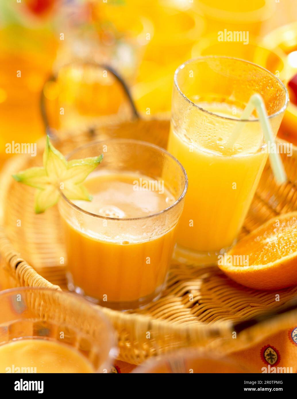 Yellow coloured juice hi-res stock photography and images - Alamy