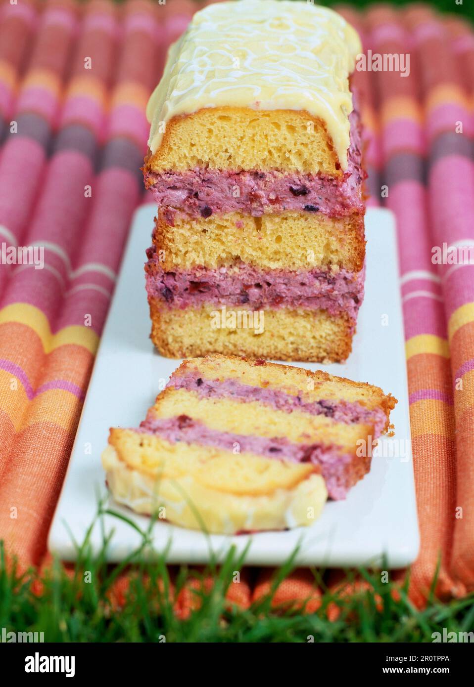 Lemon sponge cake with whipped raspberry cream Stock Photo - Alamy