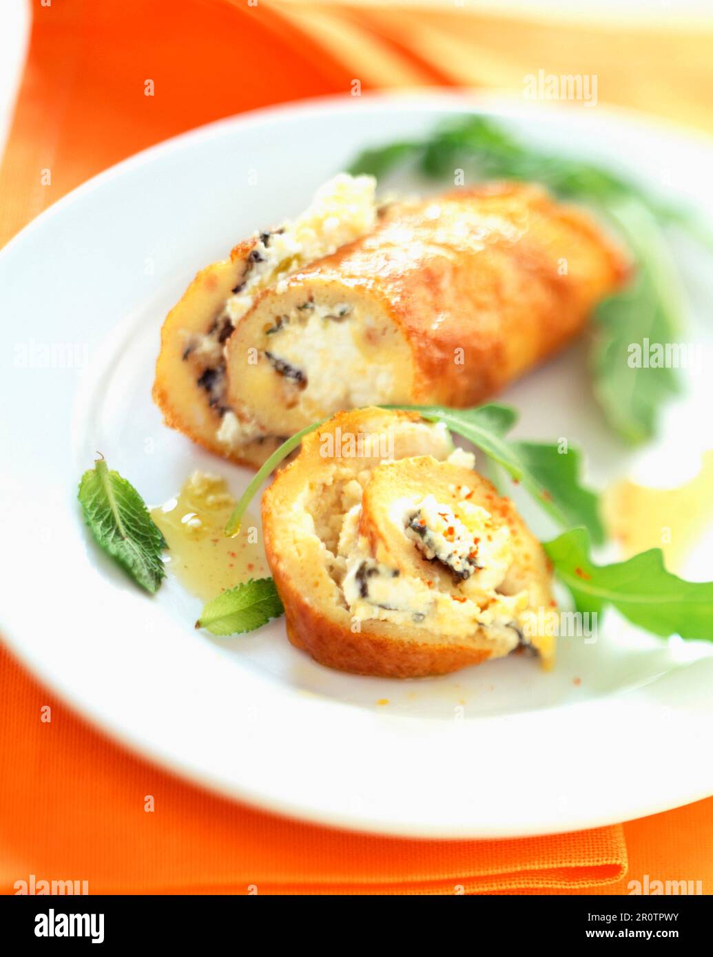 Rolled goat's cheese omelette Stock Photo - Alamy