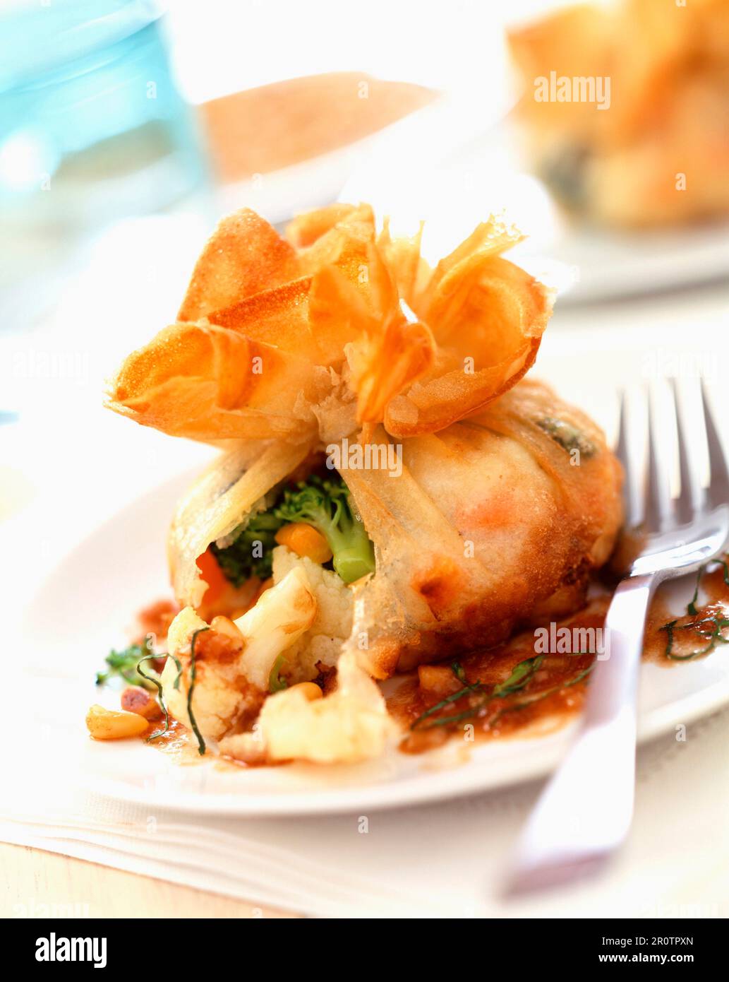 Filo pastry parcel filled with vegetables Stock Photo - Alamy