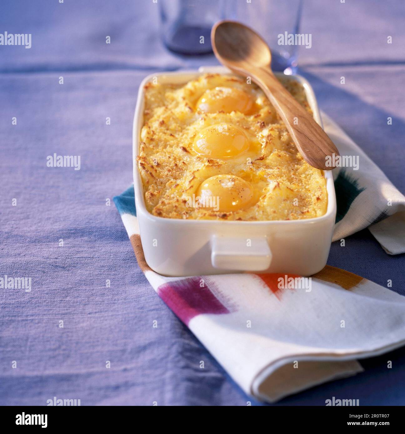 Baked eggs and mashed potatoes Stock Photo - Alamy