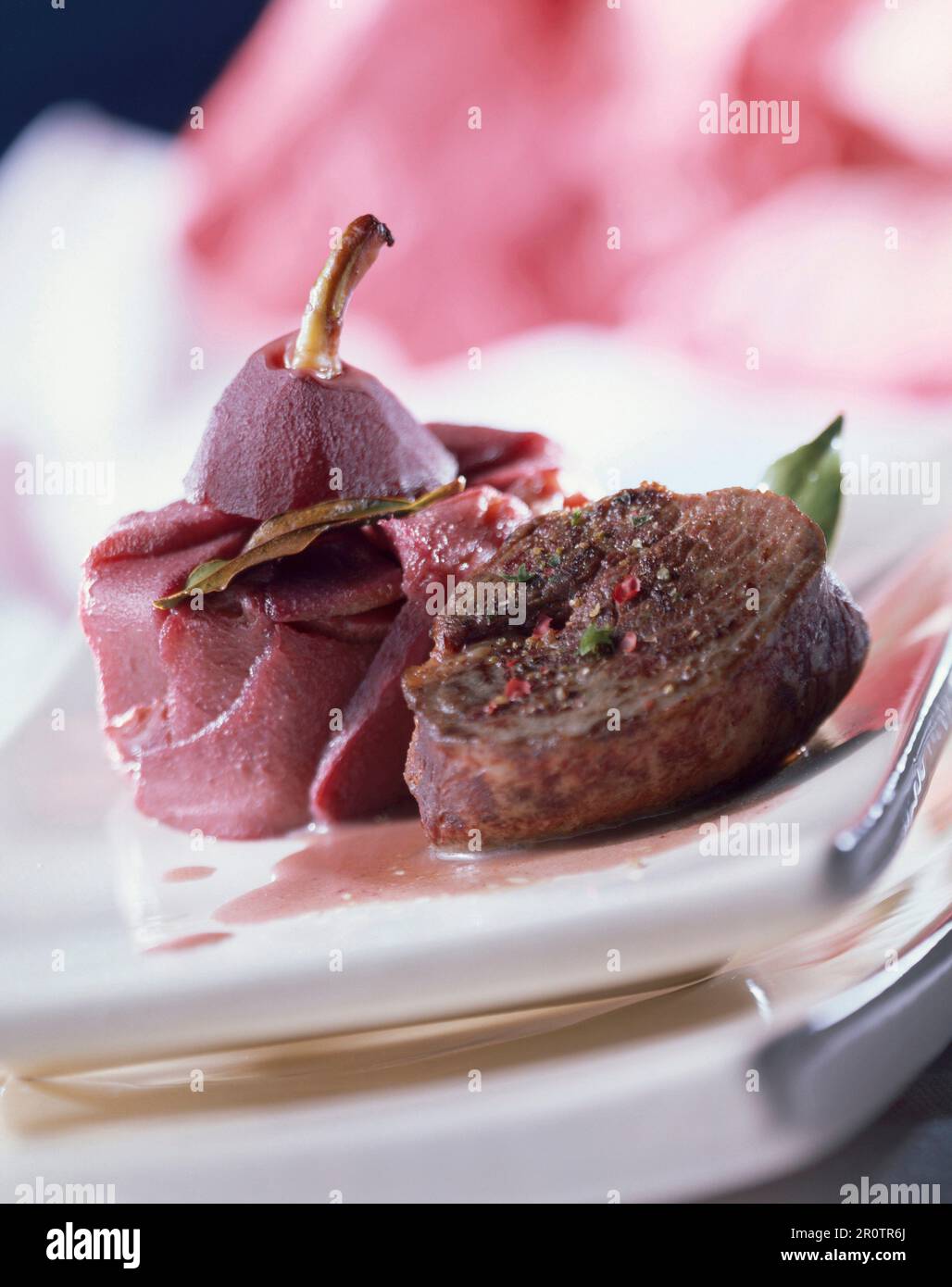 Doe fillet and pear and red wine mini charlotte Stock Photo - Alamy
