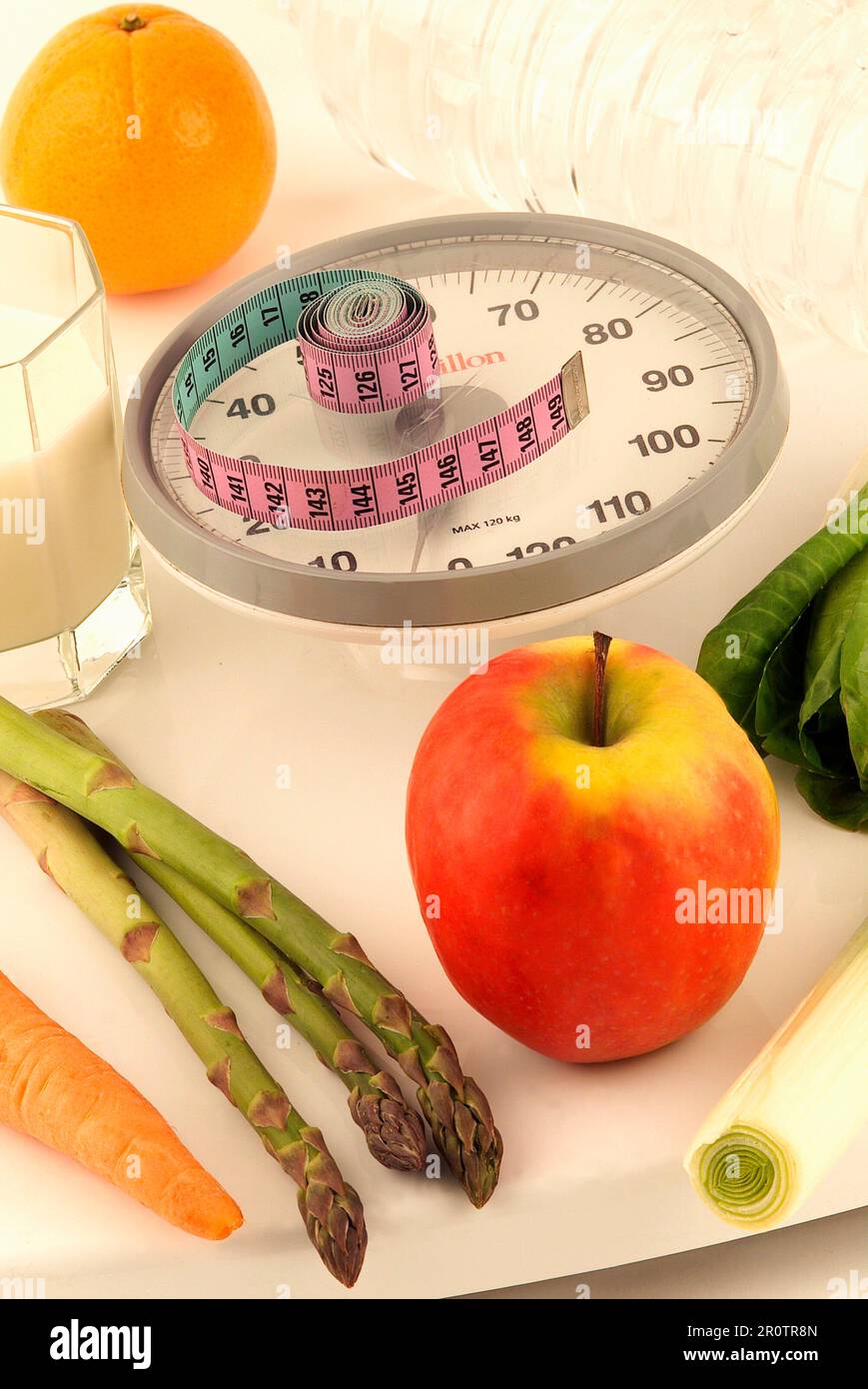 Fruit and vegetables on scales Stock Photo - Alamy