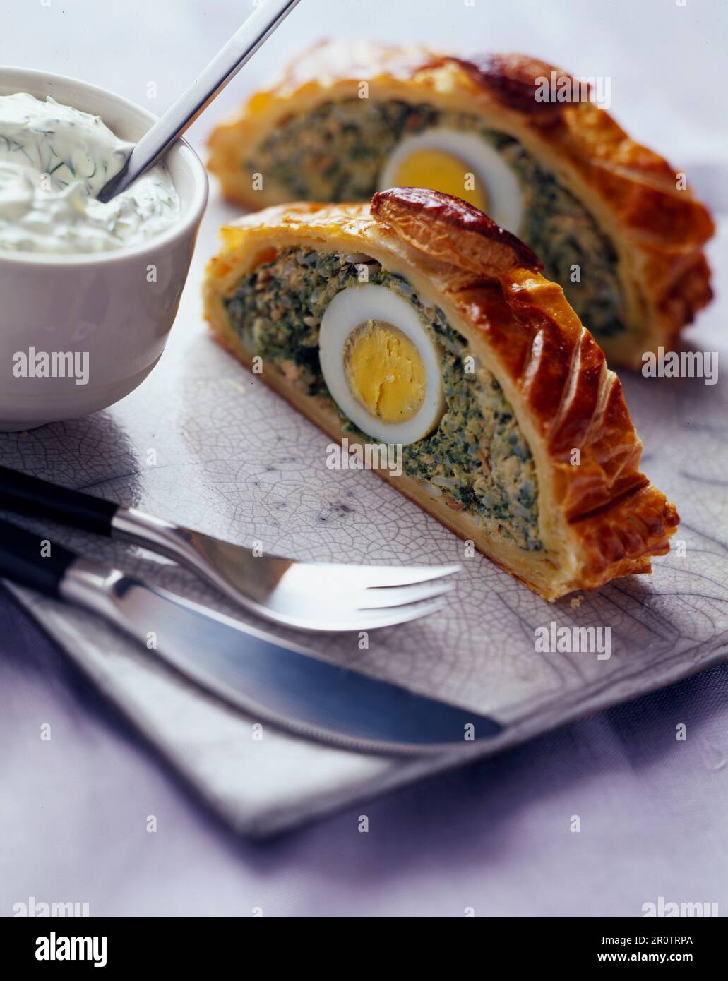 Salmon Coulibiac with juniper Stock Photo - Alamy