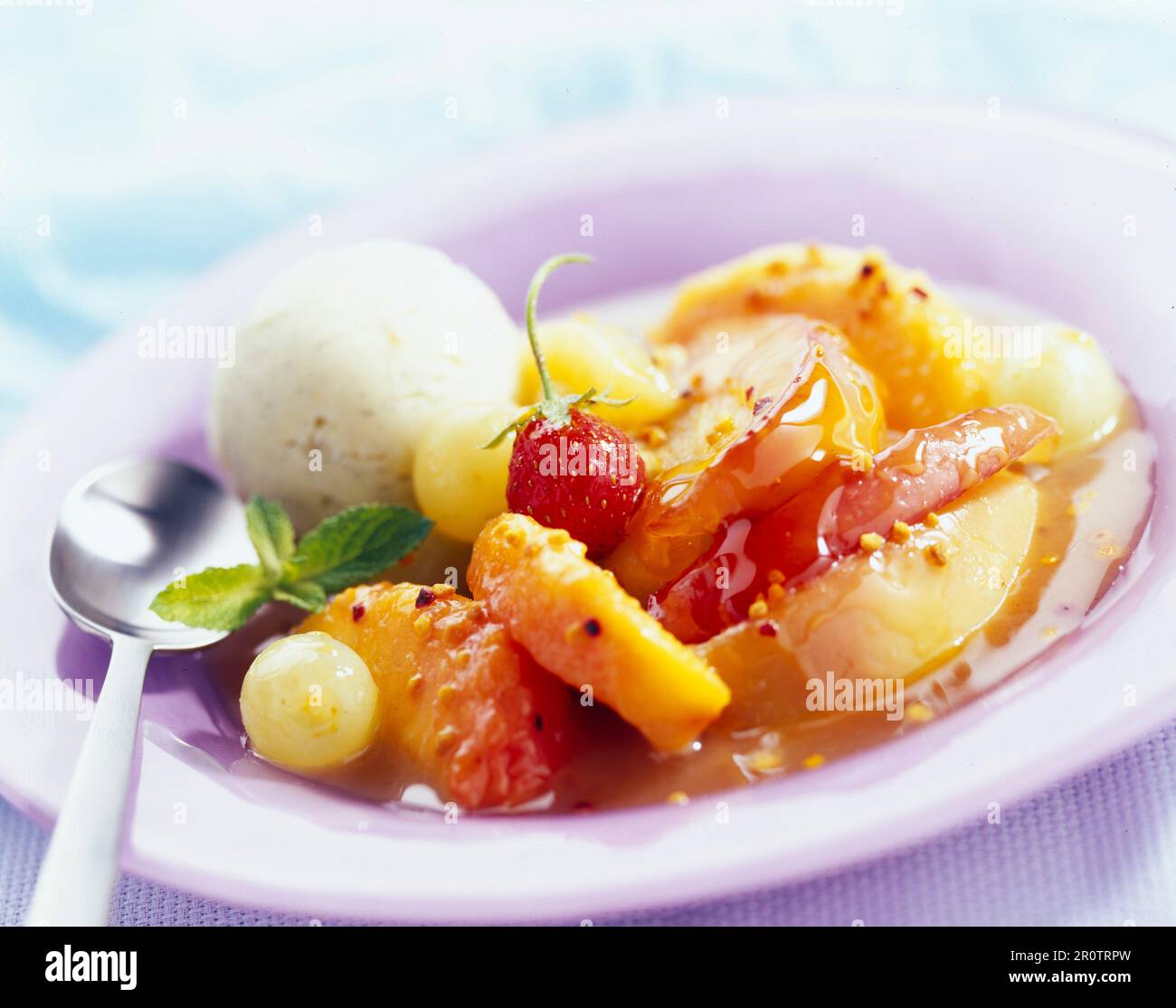 Pan-fried caramelized fruit with honey Stock Photo - Alamy