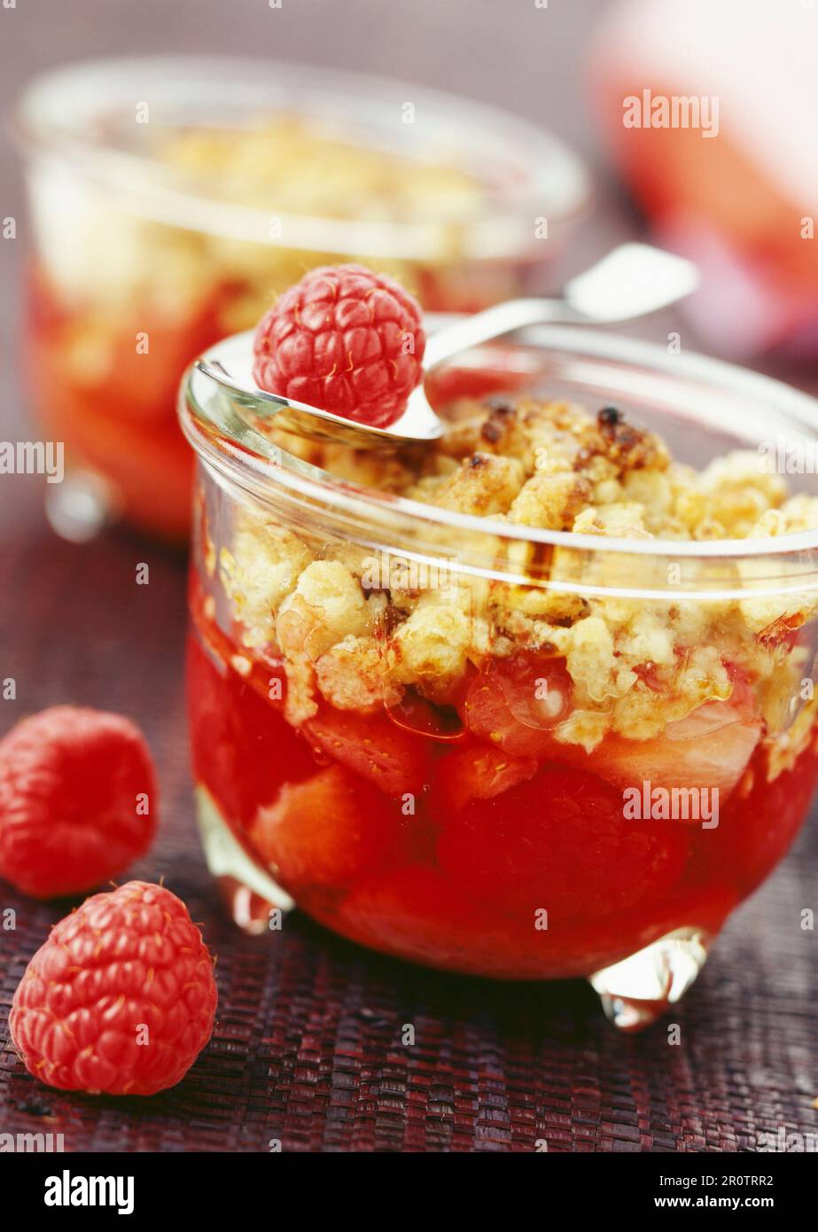 Summer fruit crumble with brown vergeoise sugar Stock Photo - Alamy
