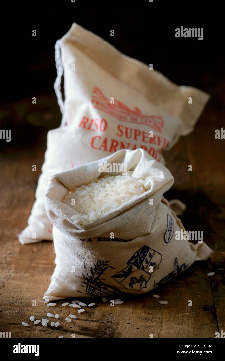 Sack of rice Stock Photo - Alamy