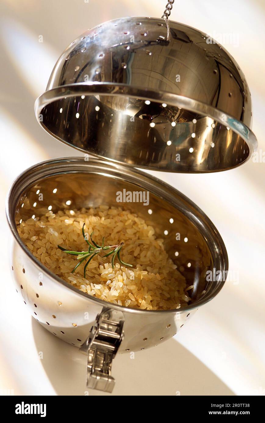 Rice ready to cook in rice ball Stock Photo - Alamy