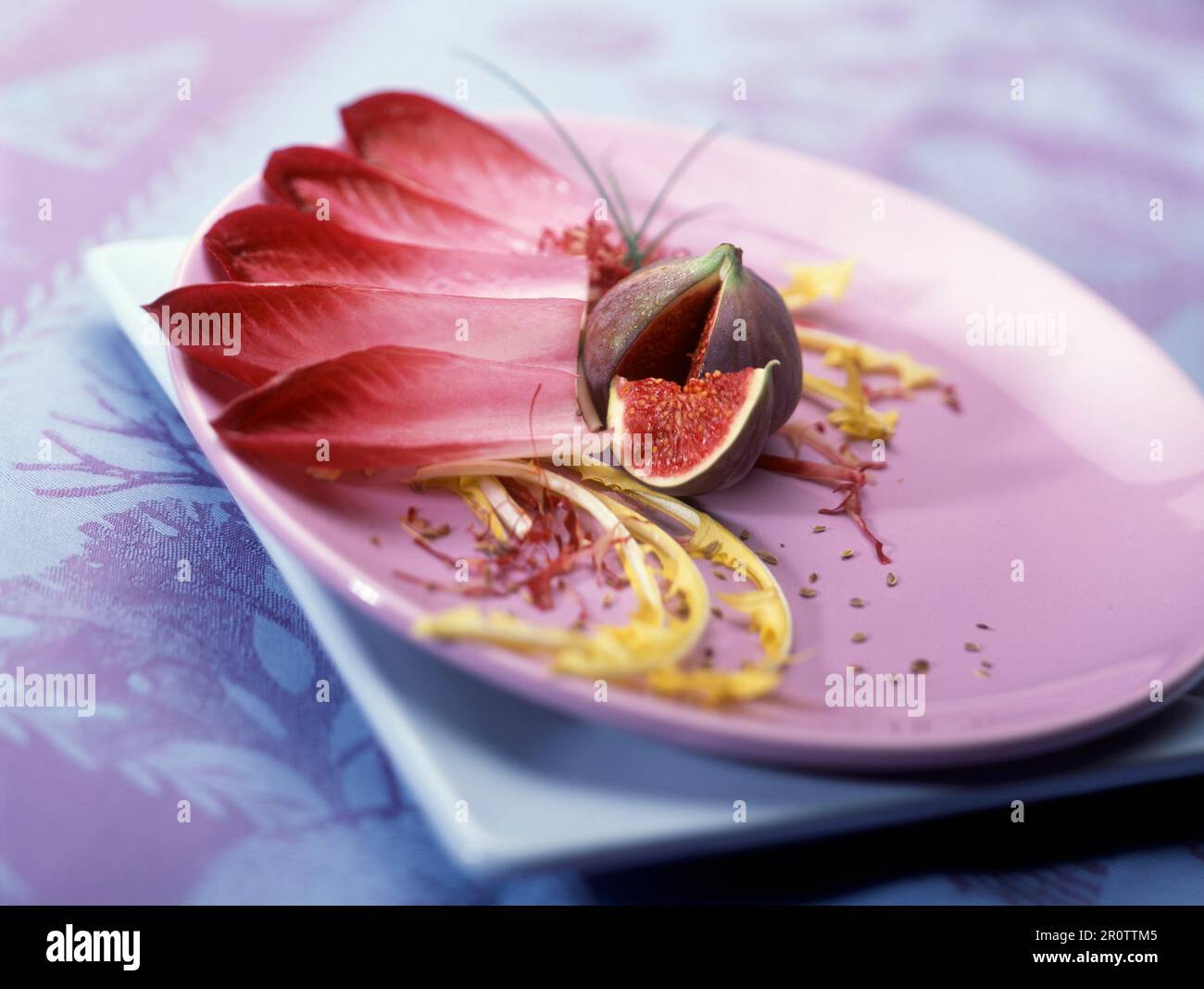 Red chicory and fig salad Stock Photo - Alamy