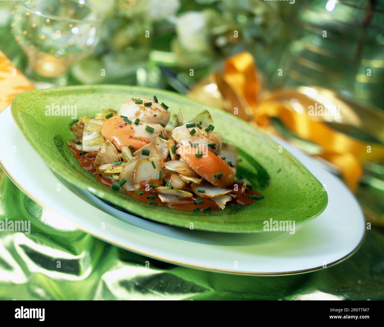 Scallops with braised chicory Stock Photo - Alamy