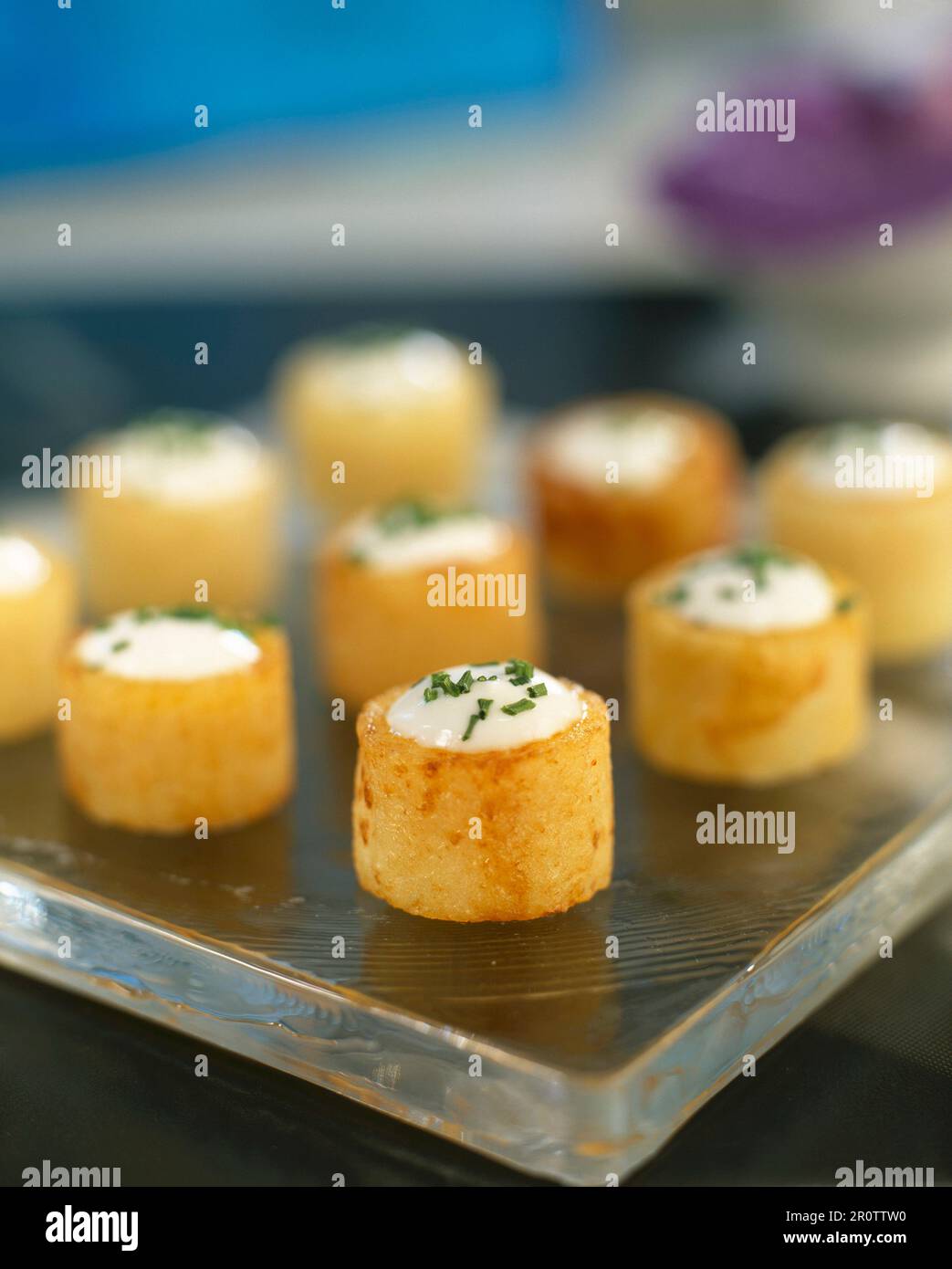 potato cylinders stuffed with cream and chives Stock Photo - Alamy
