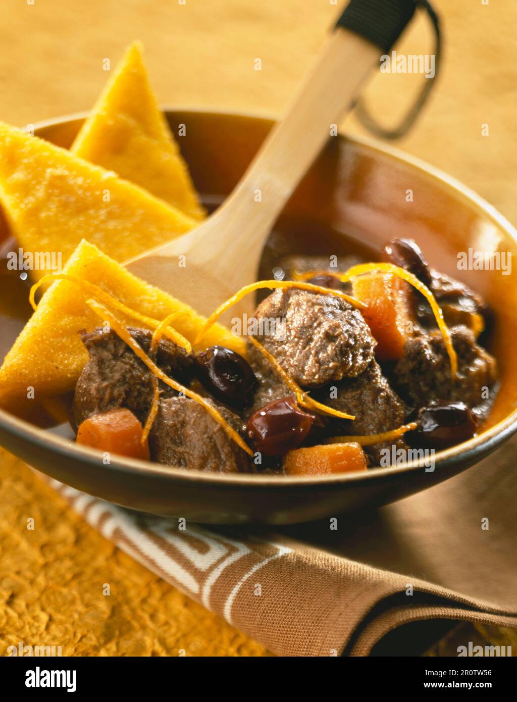 Beef and carrot stew with polenta Stock Photo - Alamy