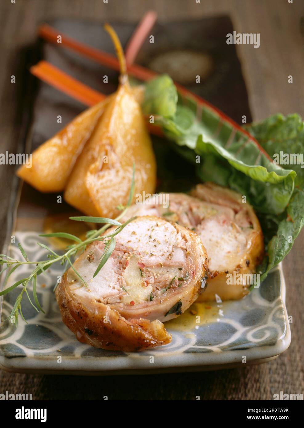 Saddle of rabbit with pears Stock Photo - Alamy