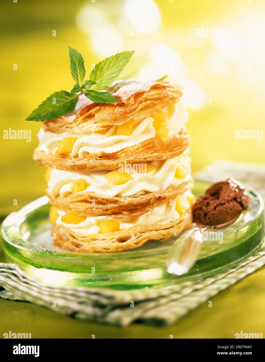 Mousse and peach in flaky pastry Stock Photo - Alamy