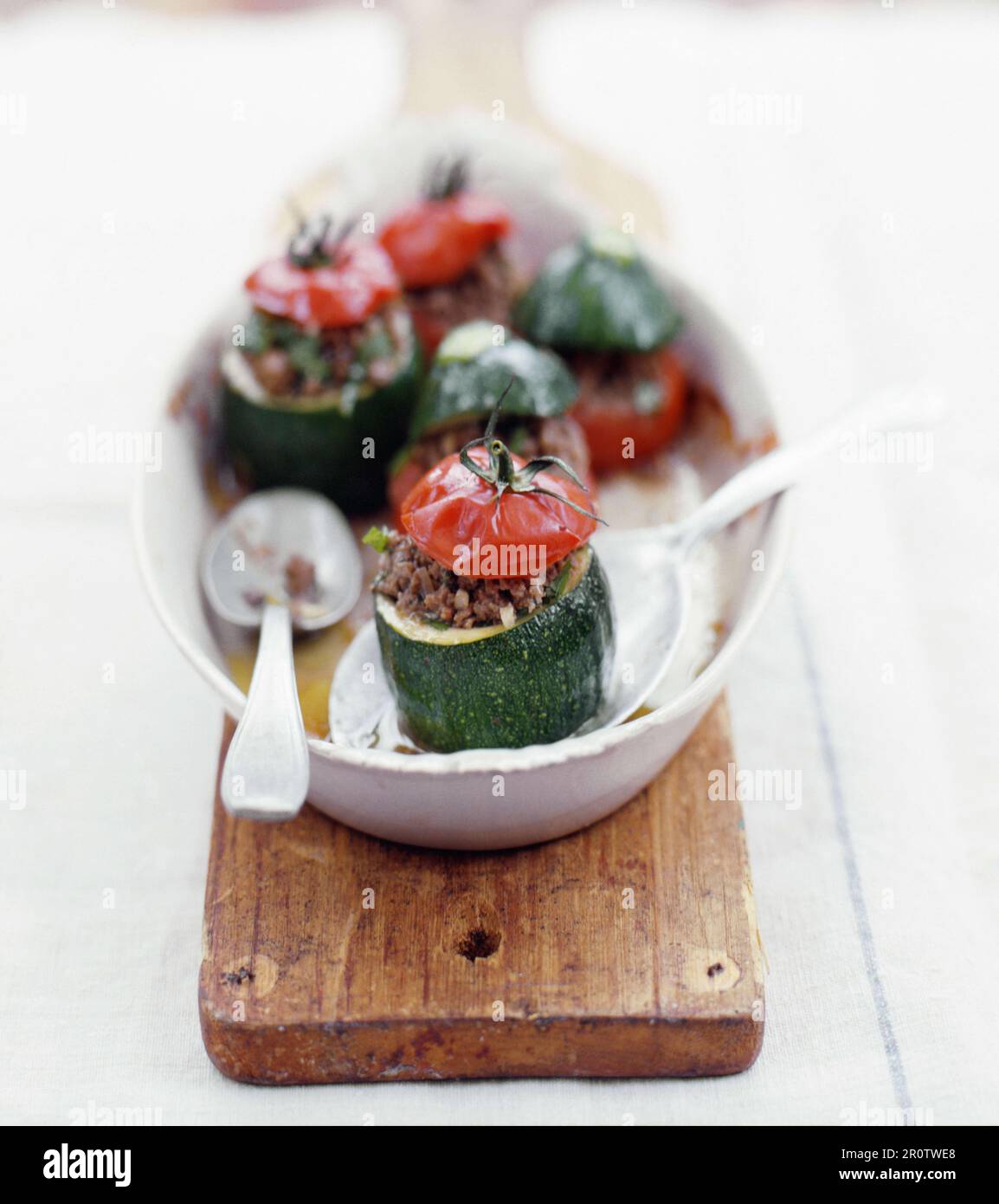 Baby courgettes stuffed with veal and coriander Stock Photo - Alamy