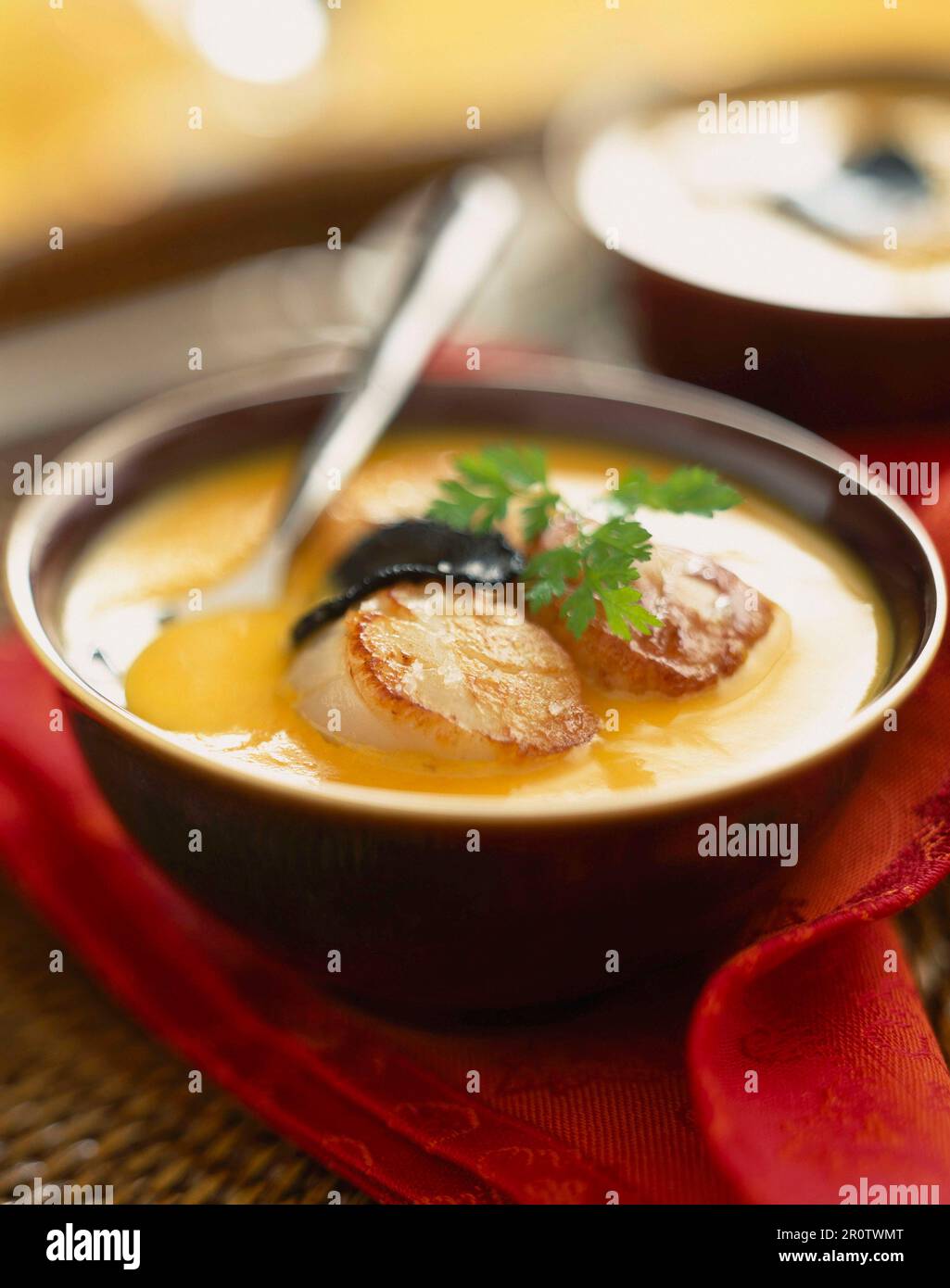 Pan-fried scallop cream soup with truffles Stock Photo - Alamy