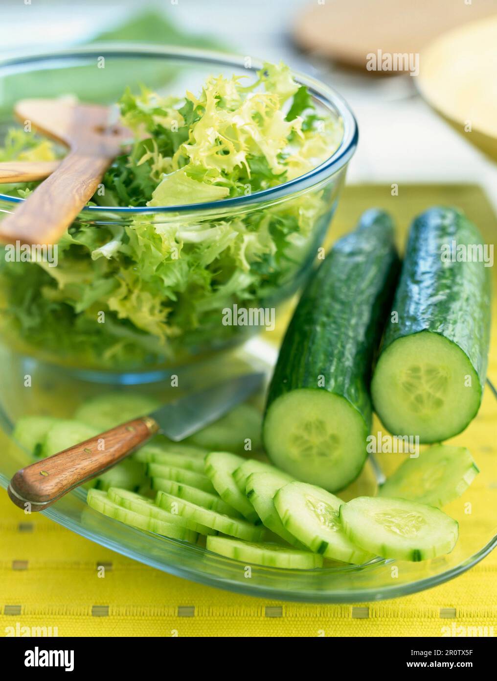 Cucumber and frizzy lettuce Stock Photo - Alamy