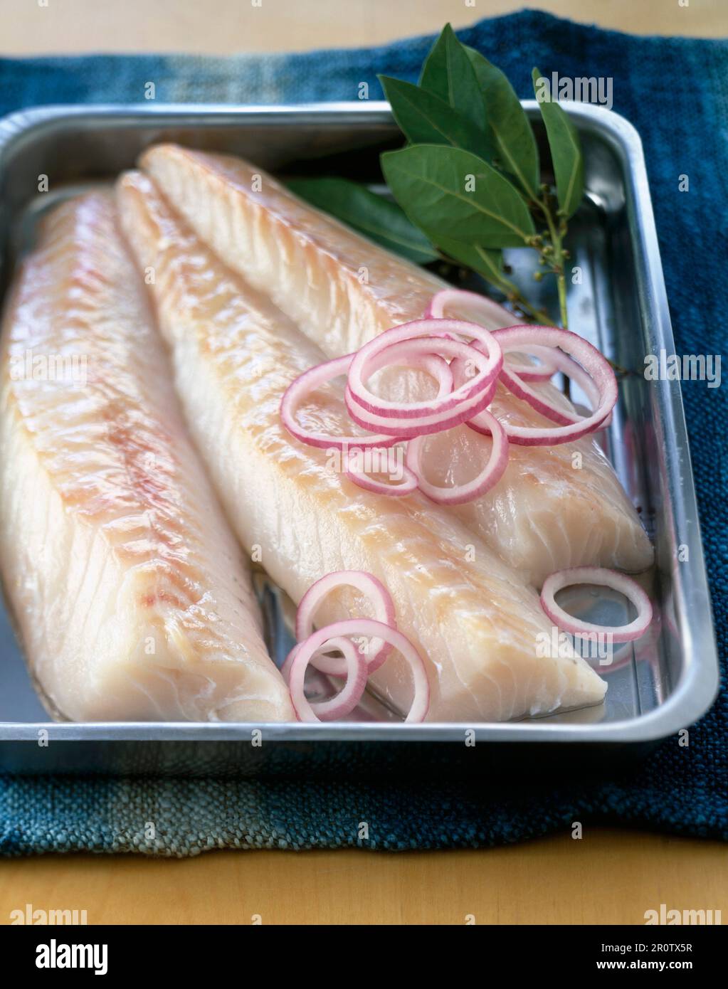 Raw cod fillets Stock Photo - Alamy