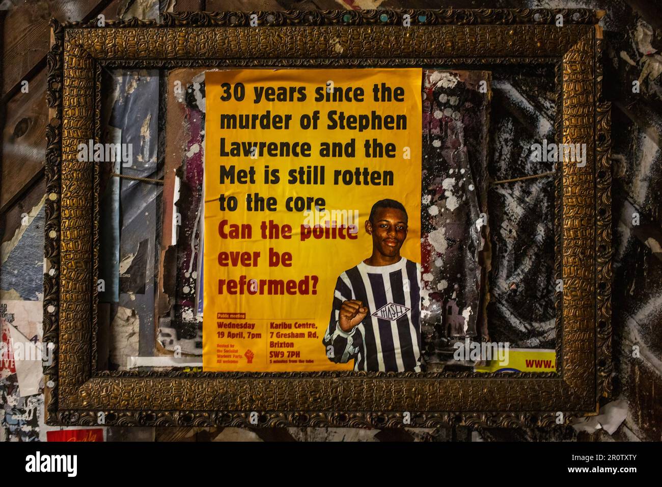 A poster of murdered schoolboy, Stephen Lawrence is seen in a golden ...